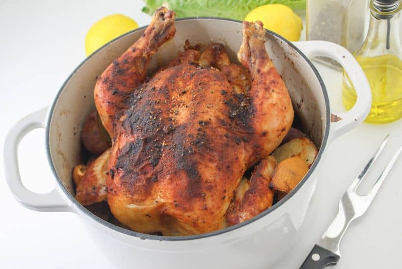 Dutch Oven Roasted Chicken with Lemon and Potatoes - The Farm Girl Gabs®